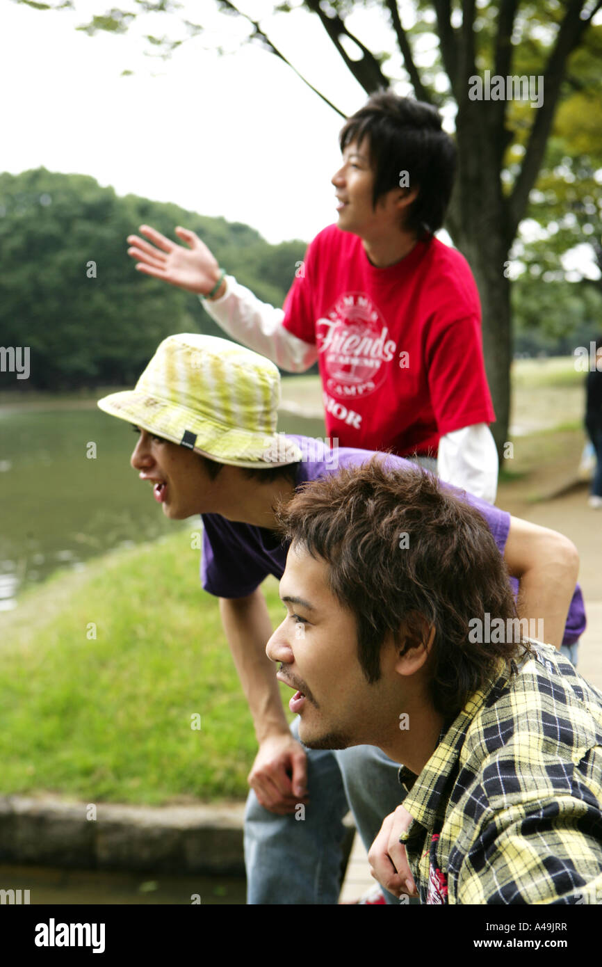 Close up of three young men looking surprised Stock Photo - Alamy