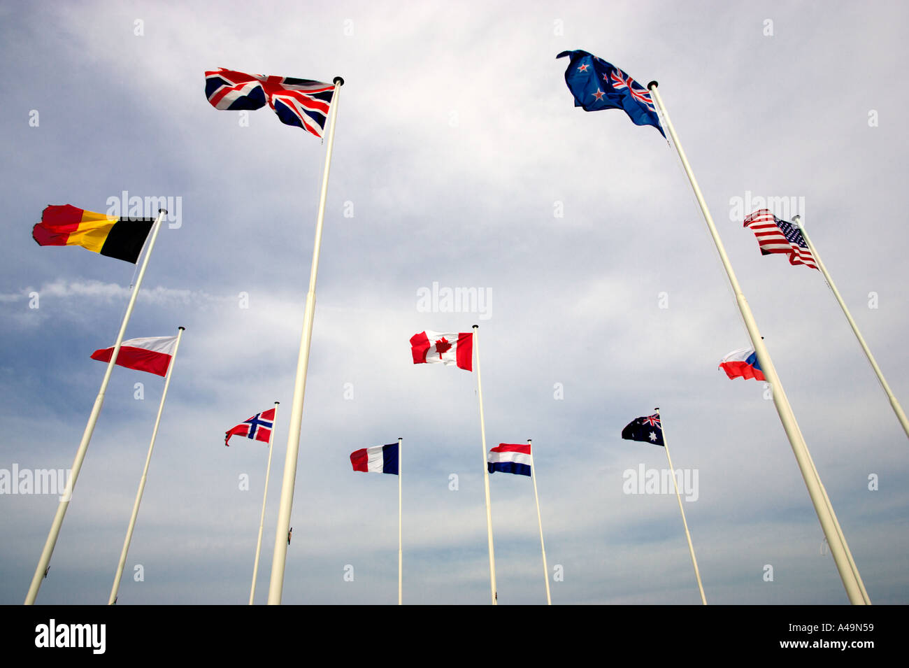 Flags outside the WW2 Juno Beach Centre, Courseulles sur mer, Normandy ...