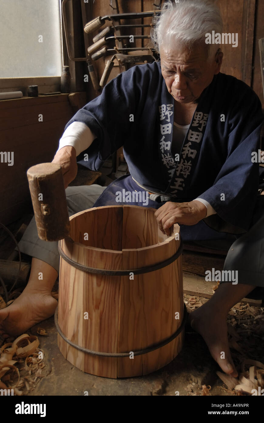 Man holding mallet hi-res stock photography and images - Alamy