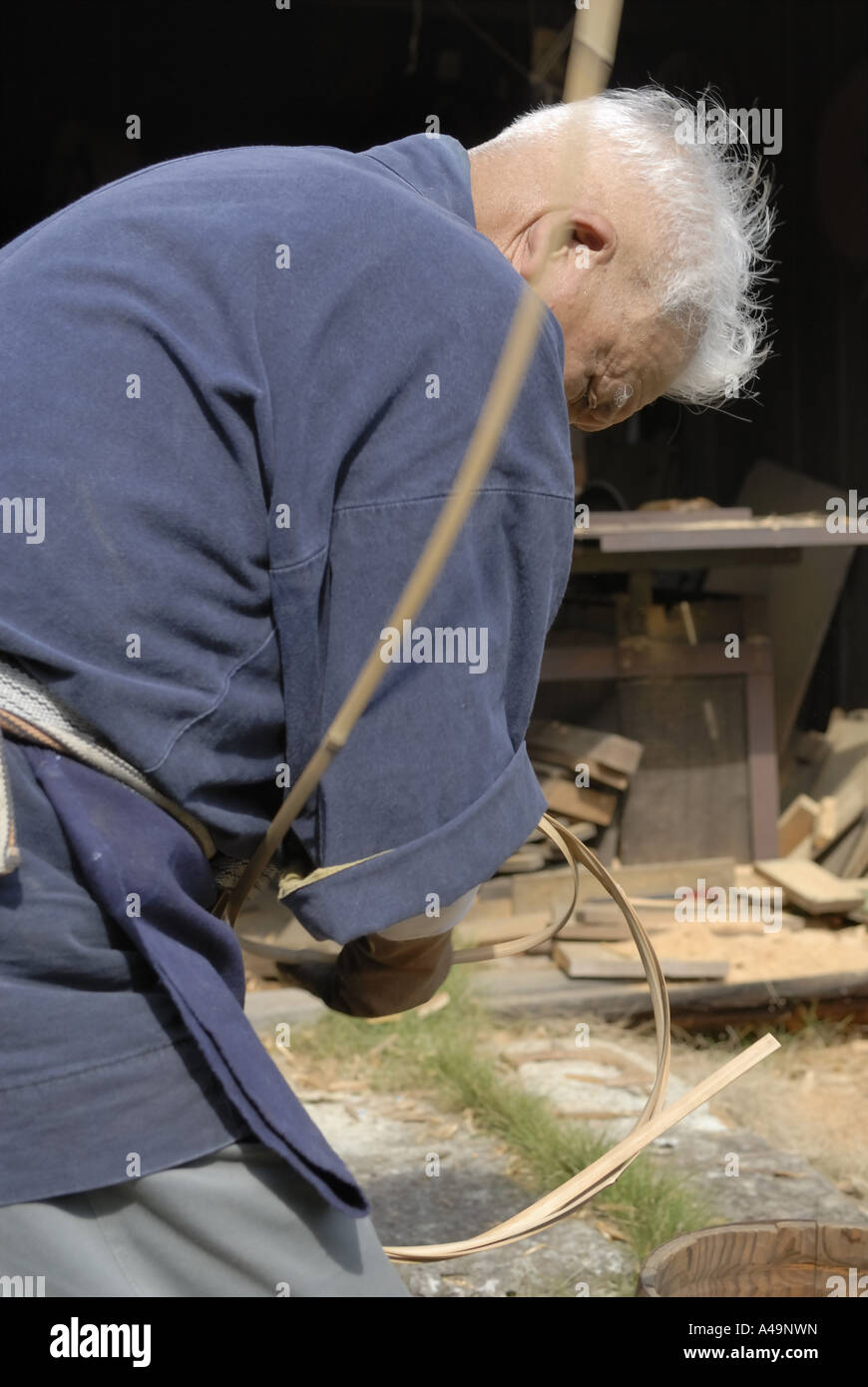 Side profile of a carpenter holding cane Stock Photo - Alamy