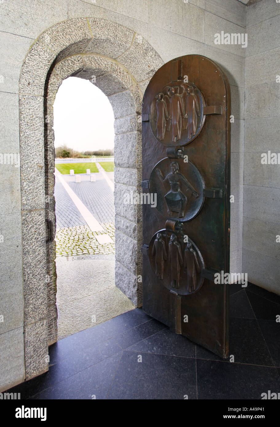 Carved wooden door entrance to the German military cemetery at La Cambe ...