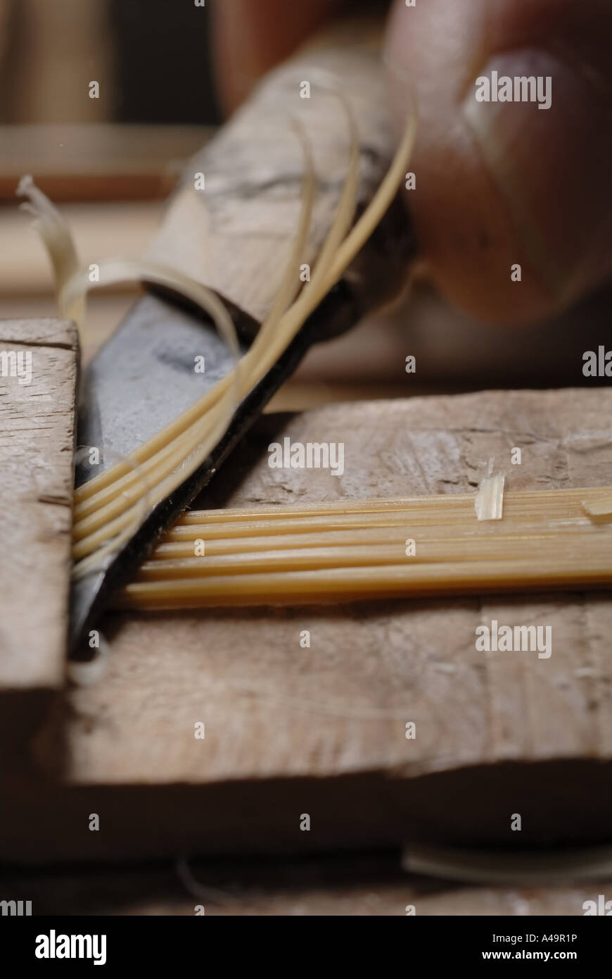 Carpenter s hand shaving wood Stock Photo - Alamy