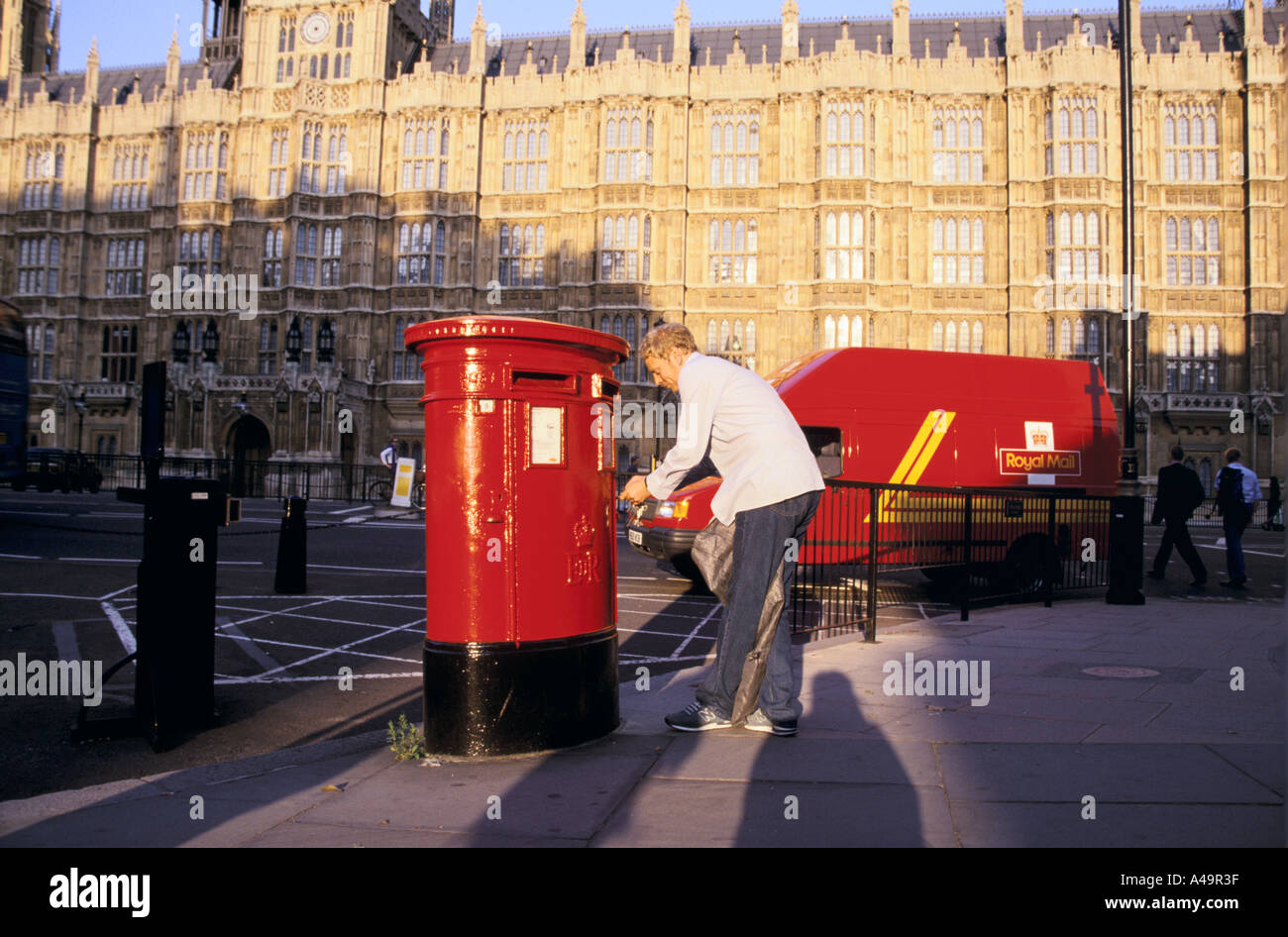 Postman emptying postbox hi-res stock photography and images - Alamy