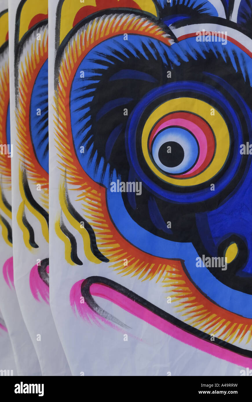 Painted sheets hanging in a workshop Stock Photo - Alamy