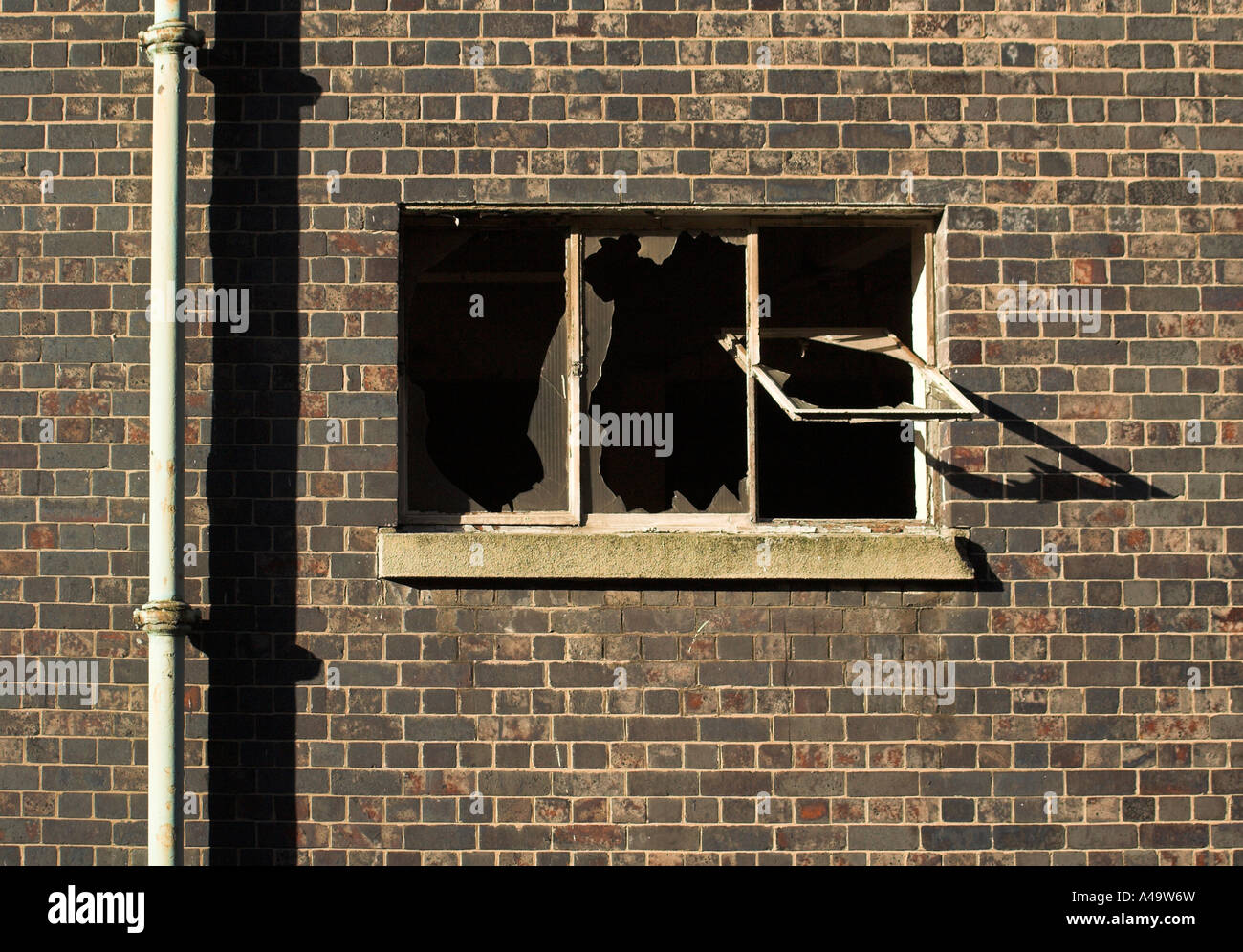 Broken windows of the derelict Employment Exchange, taken from Rochdale ...