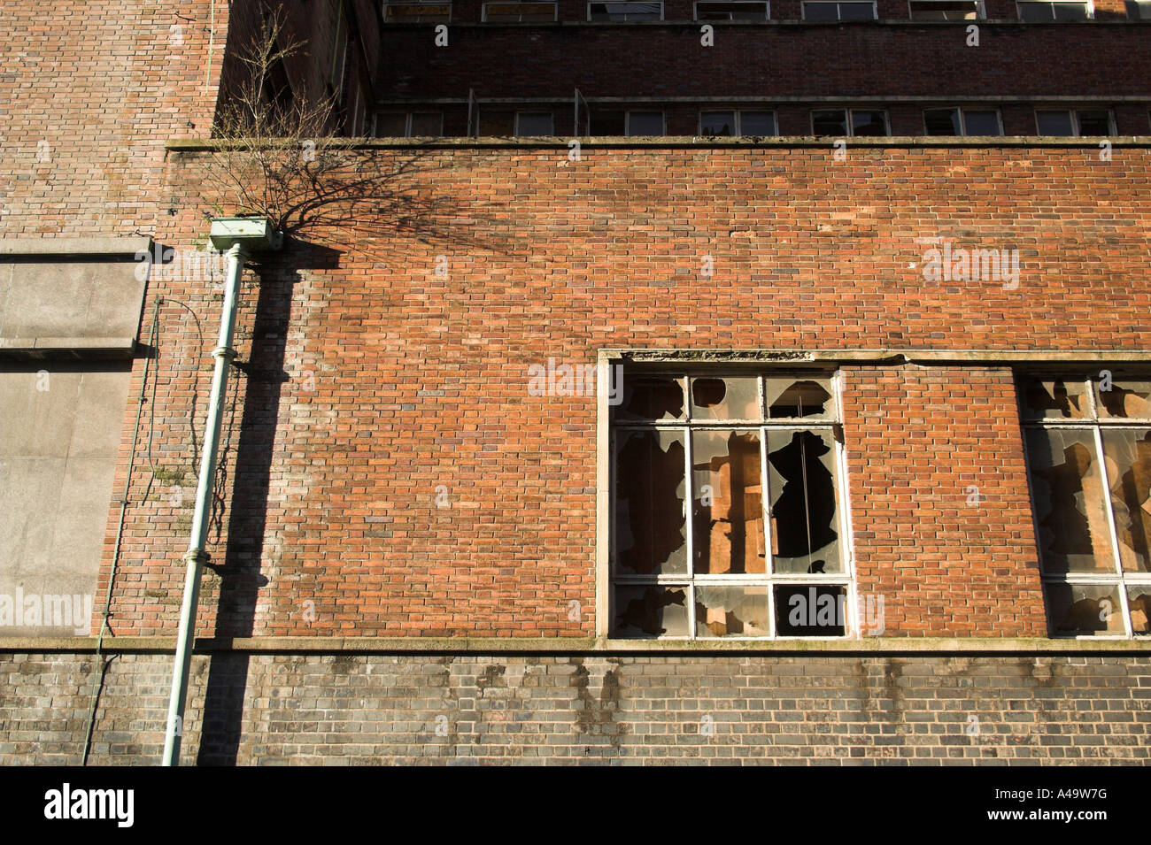 Broken windows of the derelict Employment Exchange, taken from Rochdale ...