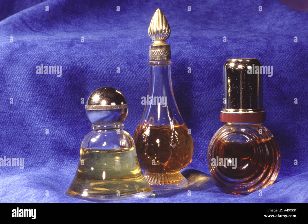 Three perfumes hi-res stock photography and images - Alamy