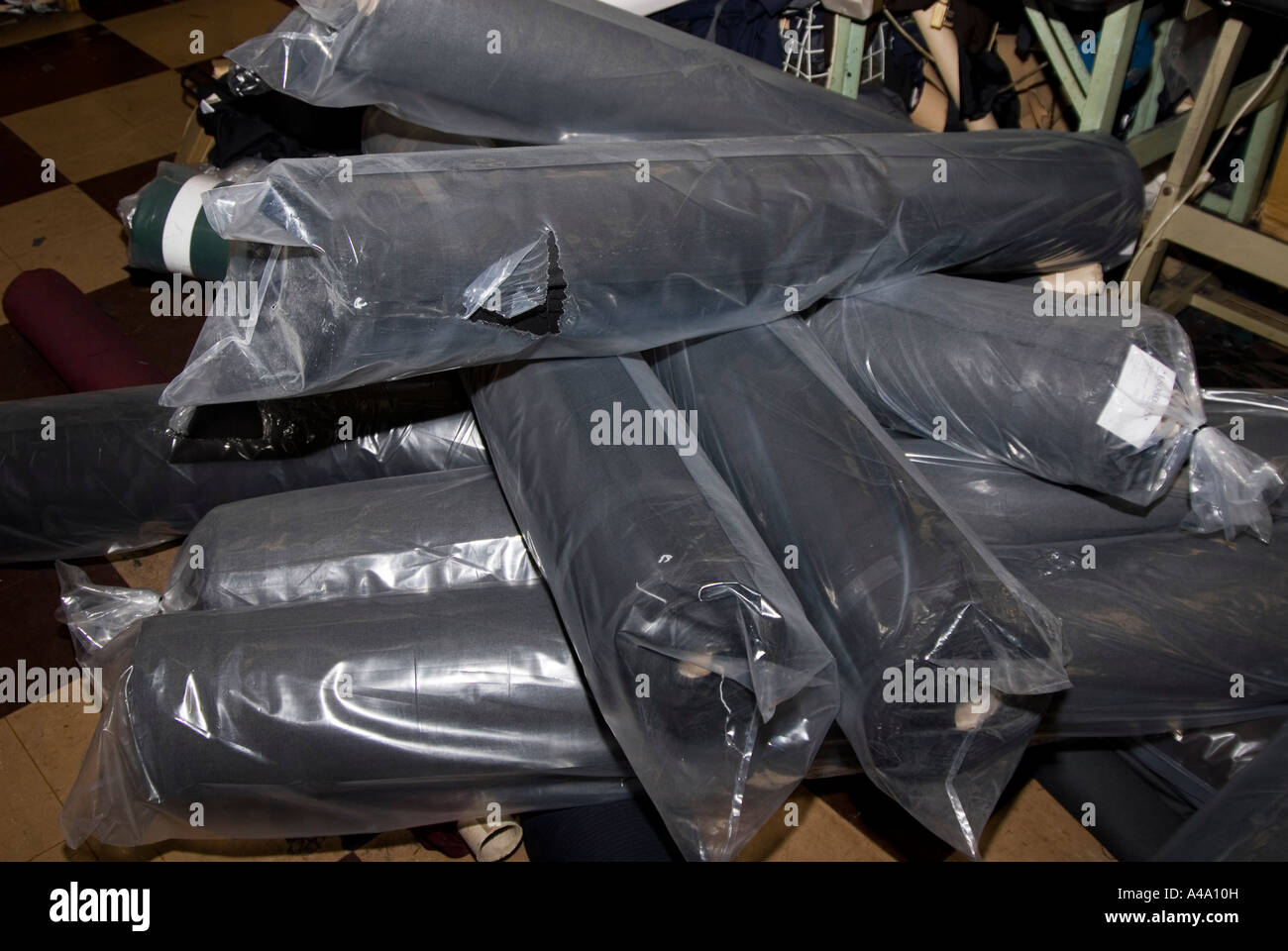 Roles of fabric in a sewing factory Stock Photo - Alamy