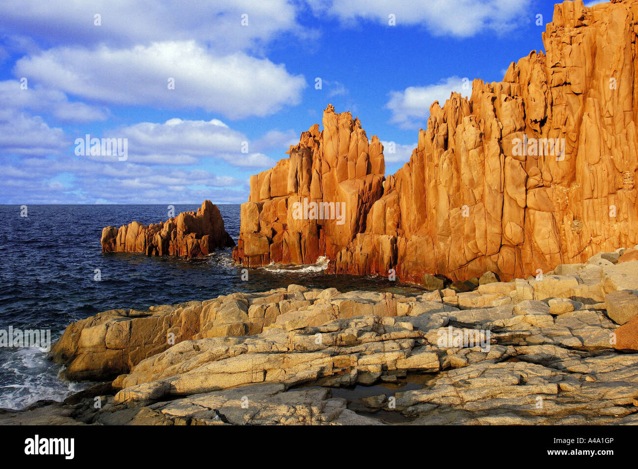 red cliff-lined coast, Italy, Sardegna Stock Photo - Alamy