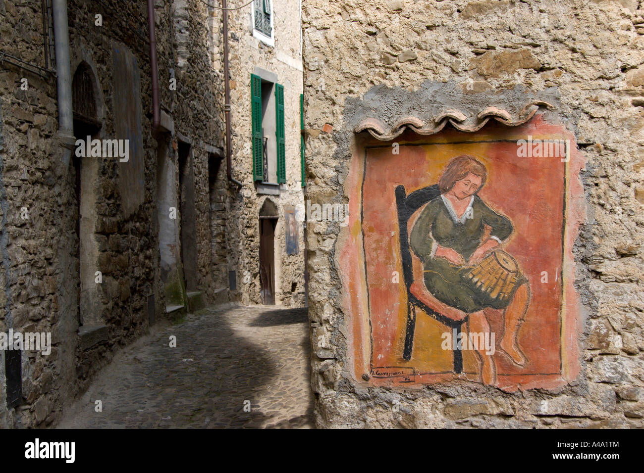 Typical painting on wall Apricale Ligury Italy Stock Photo - Alamy