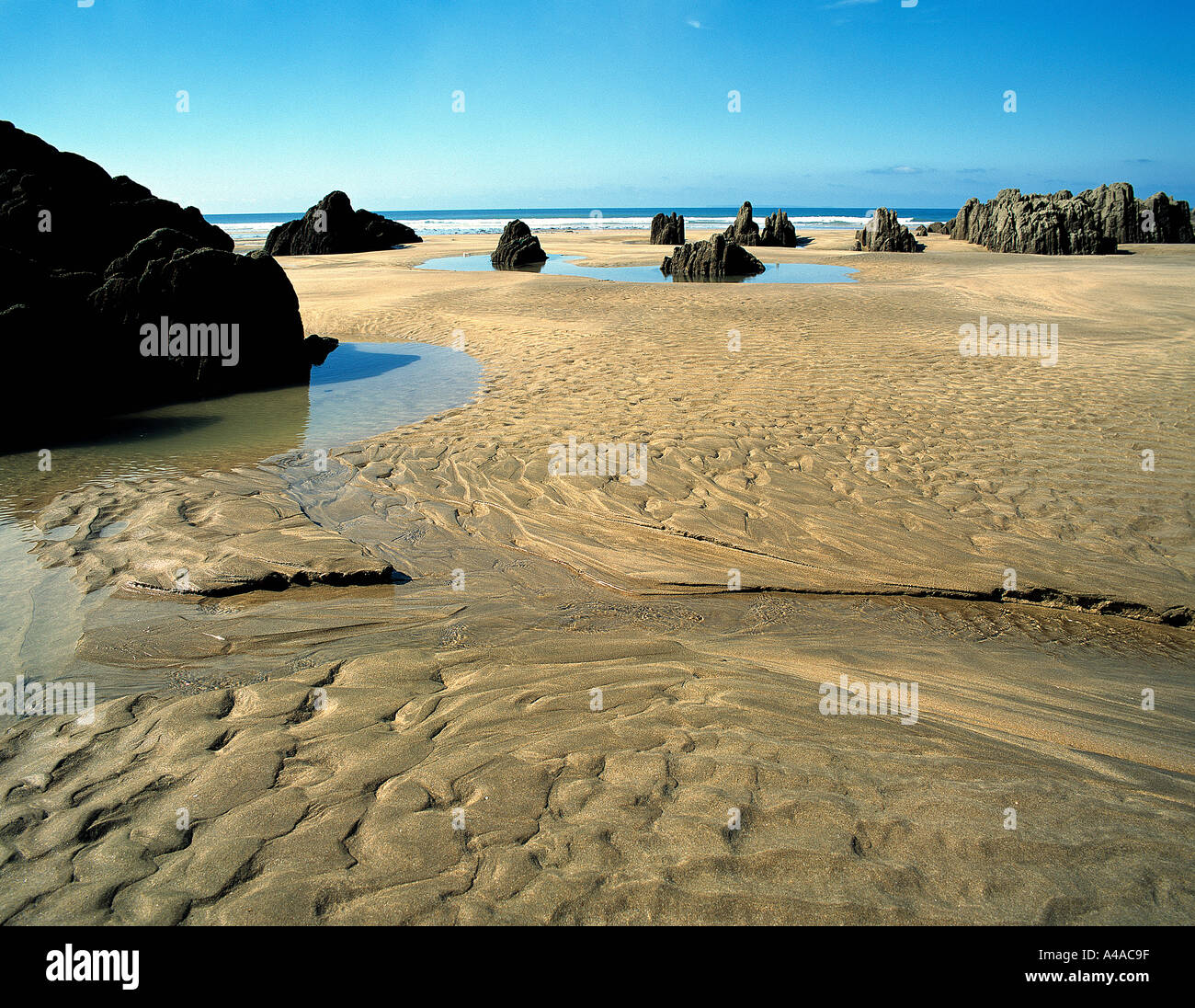 LOW TIDE ON COMBESGATE BEACH BARRICANE BEACH WOOLACOMBE DEVON ENGLAND ...