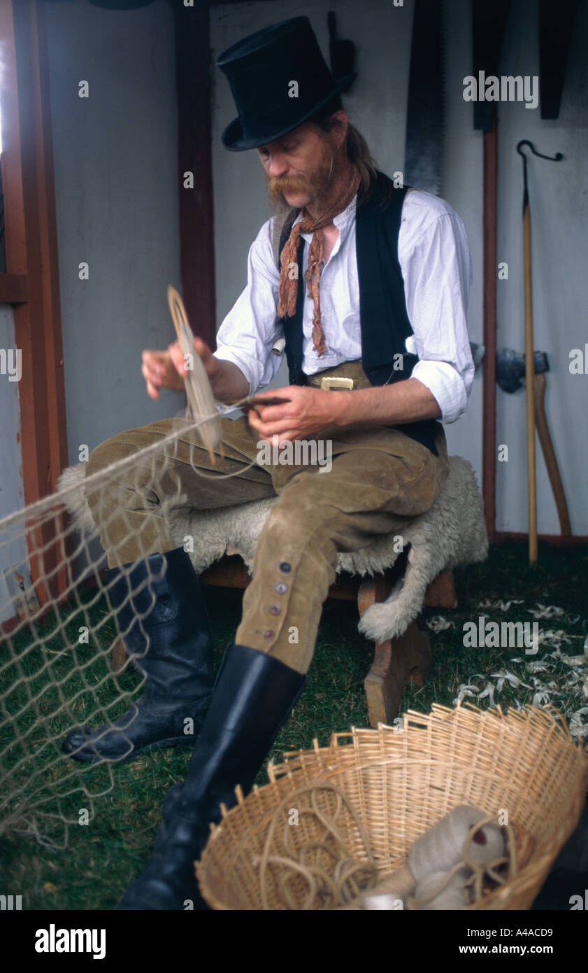Gamekeeper Poacher in Victorian Edwardian Dress makes rabbit catching ...