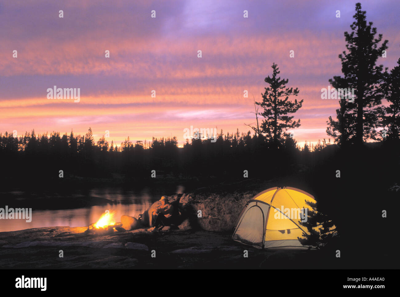 Camping scene at sunset near lake California USA Stock Photo - Alamy