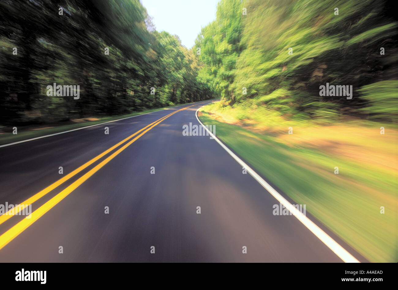 Blurred road scene Stock Photo - Alamy