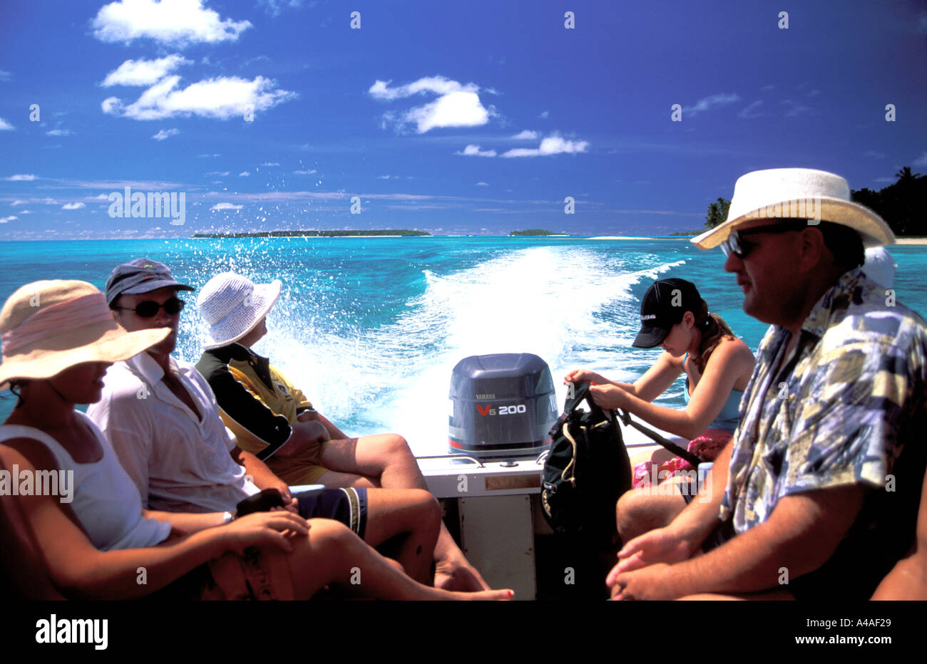 Cook Islands Aitutaki Tourists on a boat in the lagoon Stock Photo - Alamy