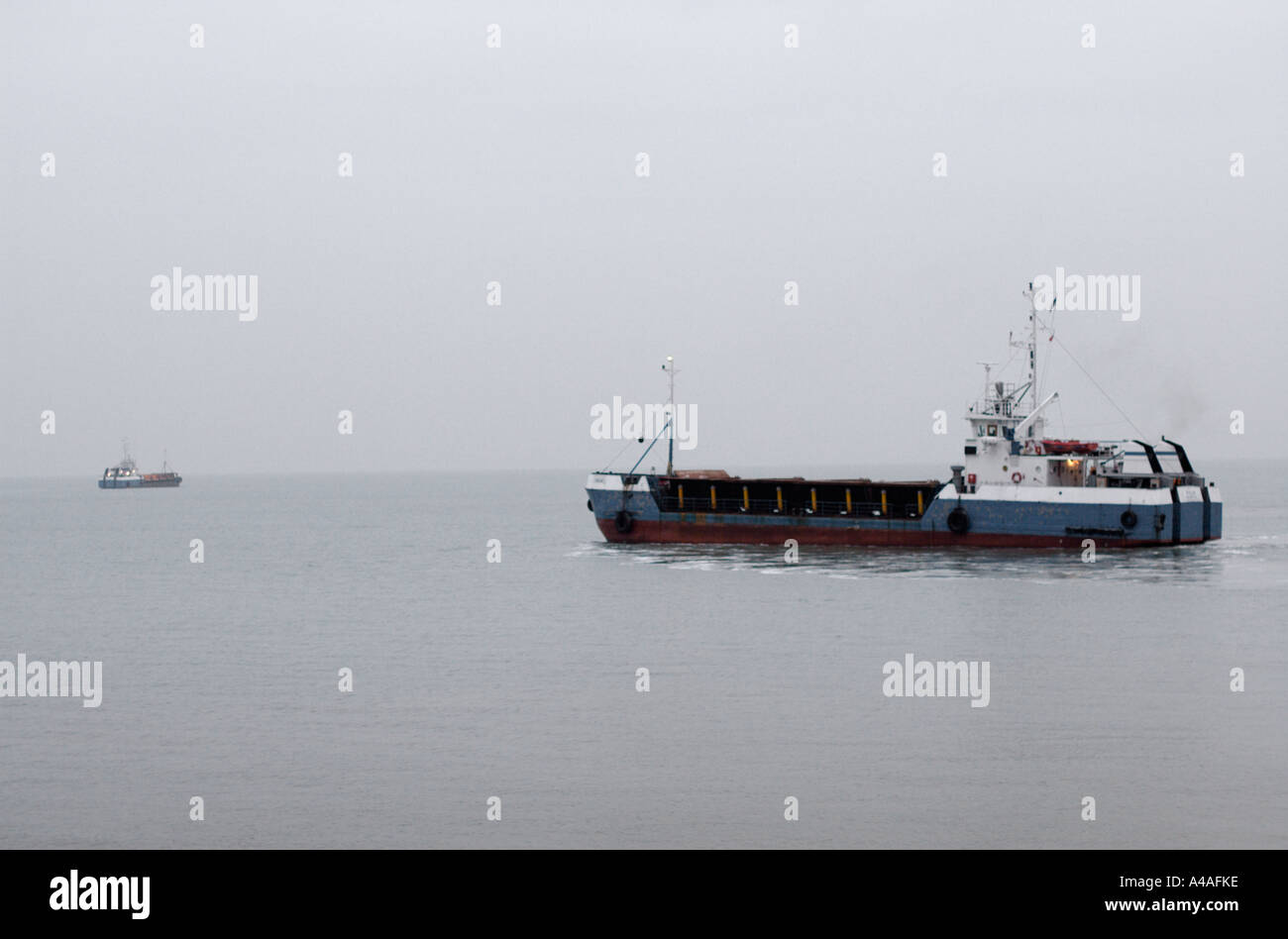 Two bulk ore cargo ships Stock Photo - Alamy