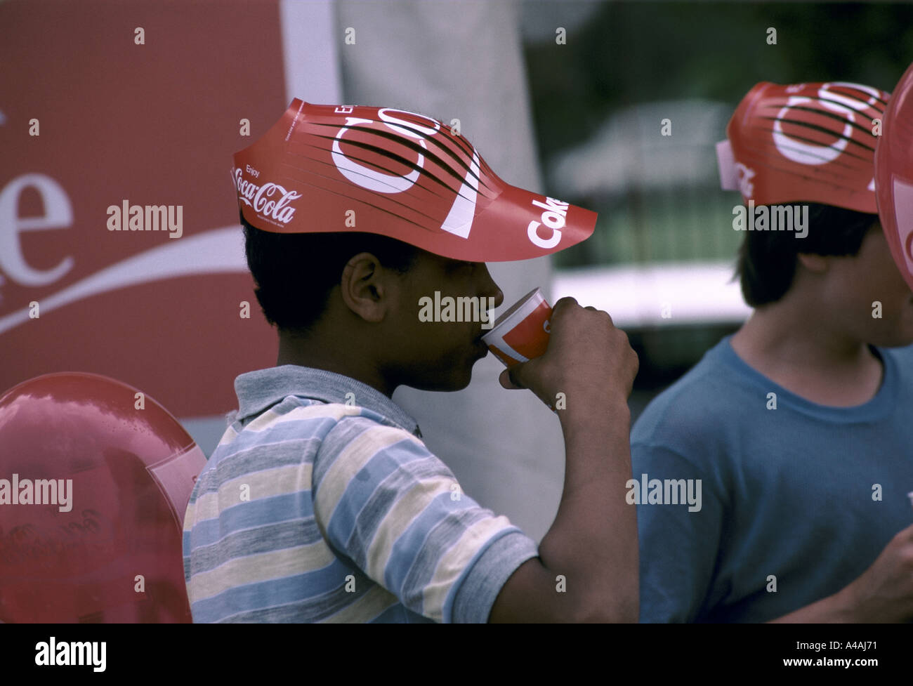 Coca cola drinking child hi-res stock photography and images - Alamy