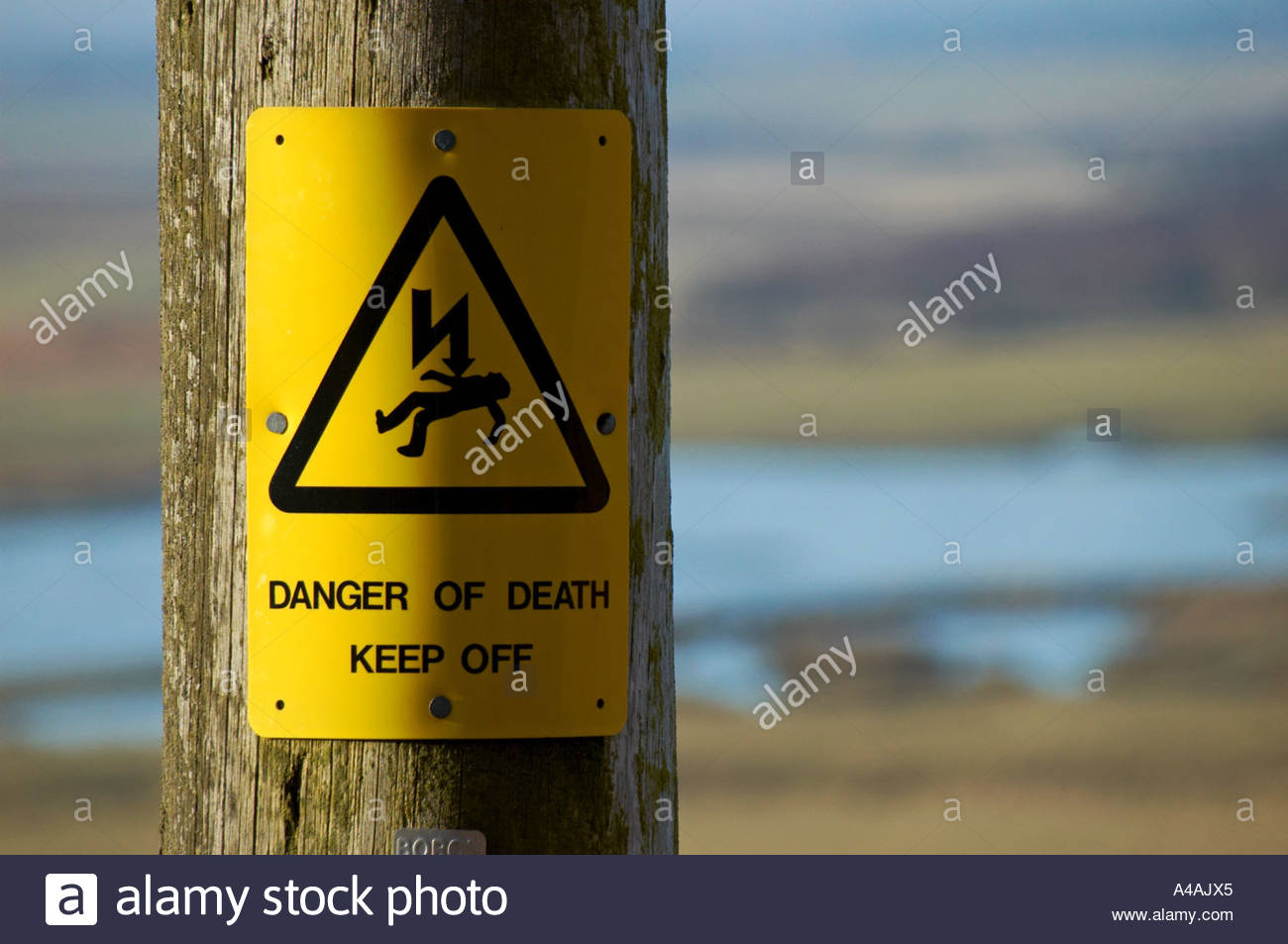 Warning Sign On Electricity Pylon Stock Photos & Warning Sign On ...