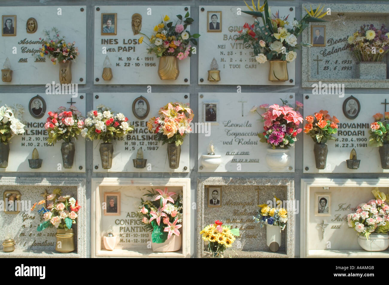 Italian cemetry with flowers names and photographs of the deceased ...
