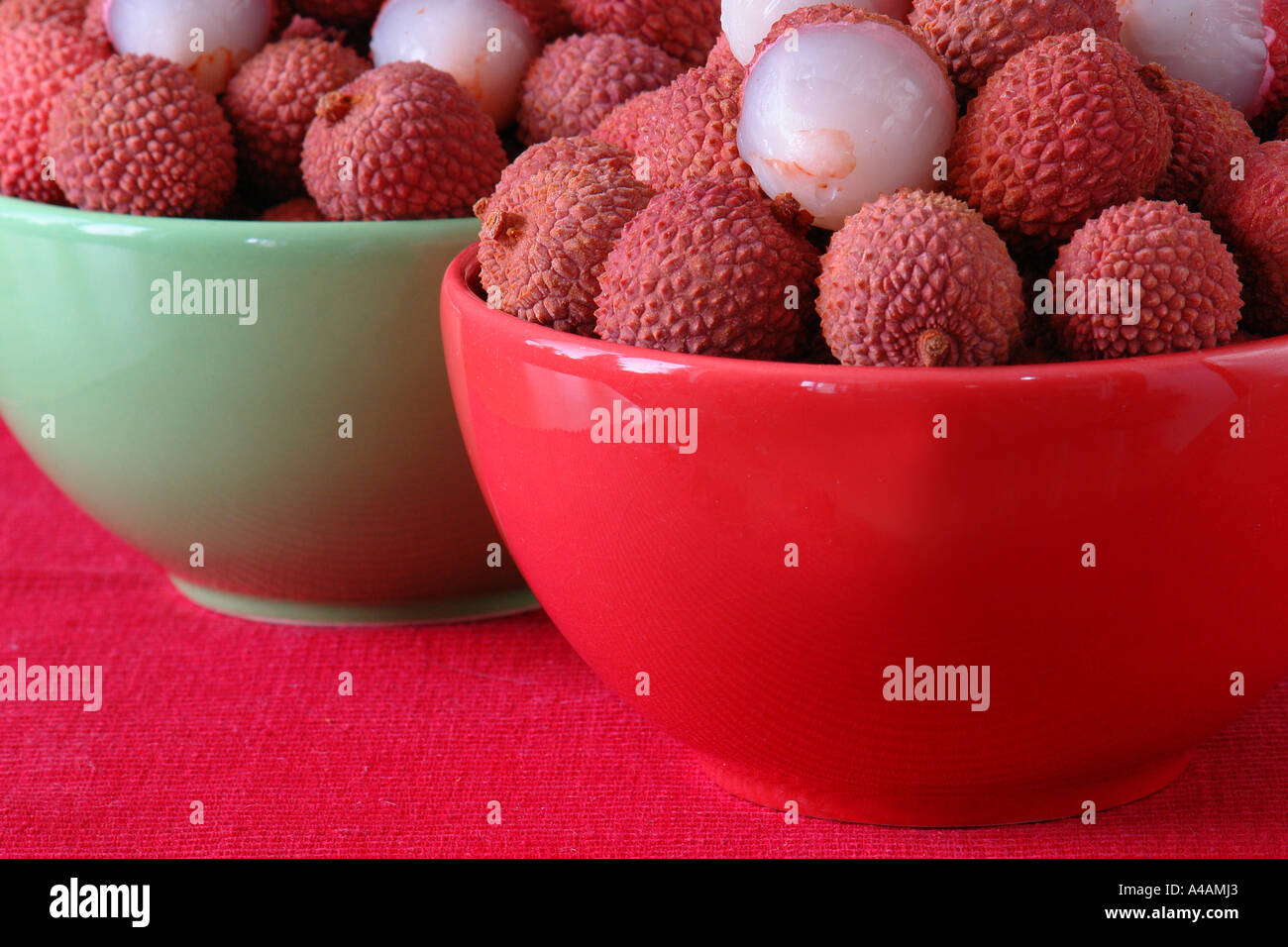 Litchis Leechees Lytchees in the red and green bowls Sapindaceae Stock ...