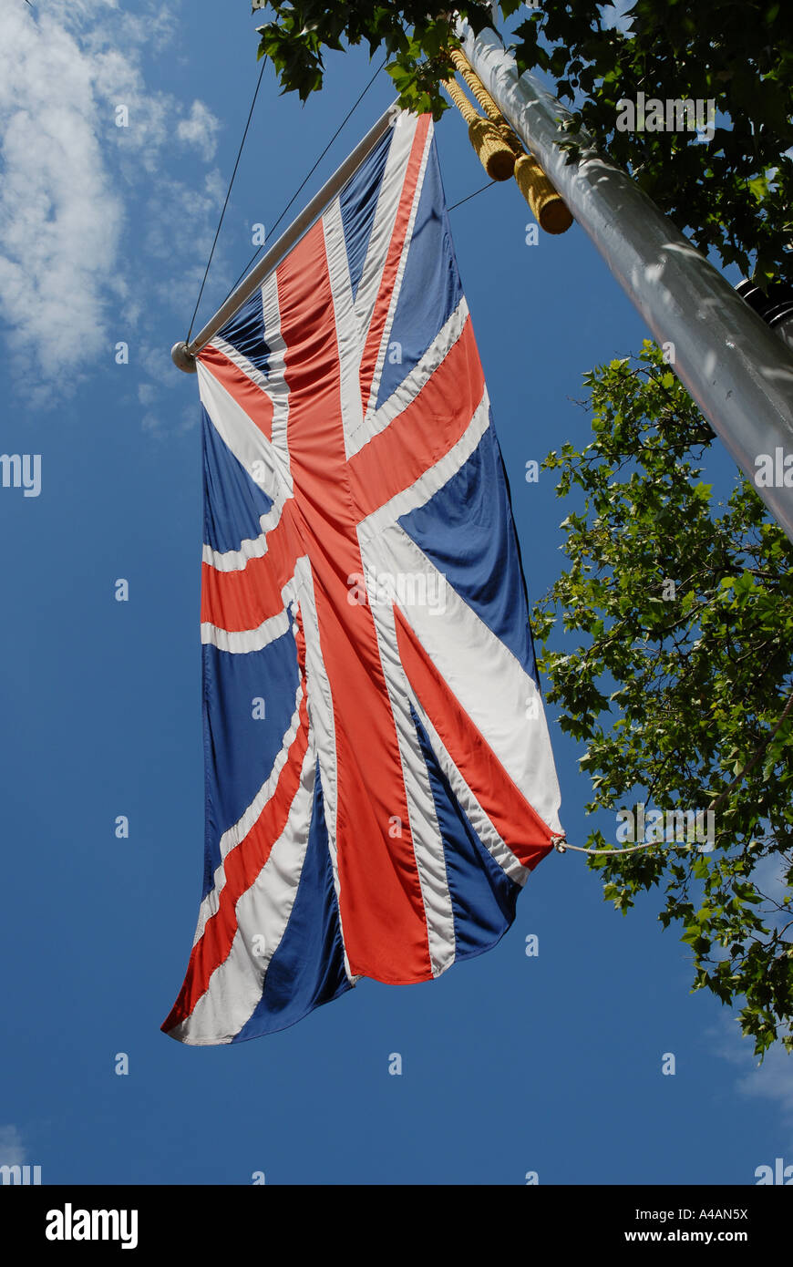 A Union Jack flag hangs at the side of Pall Mall, London Stock Photo ...