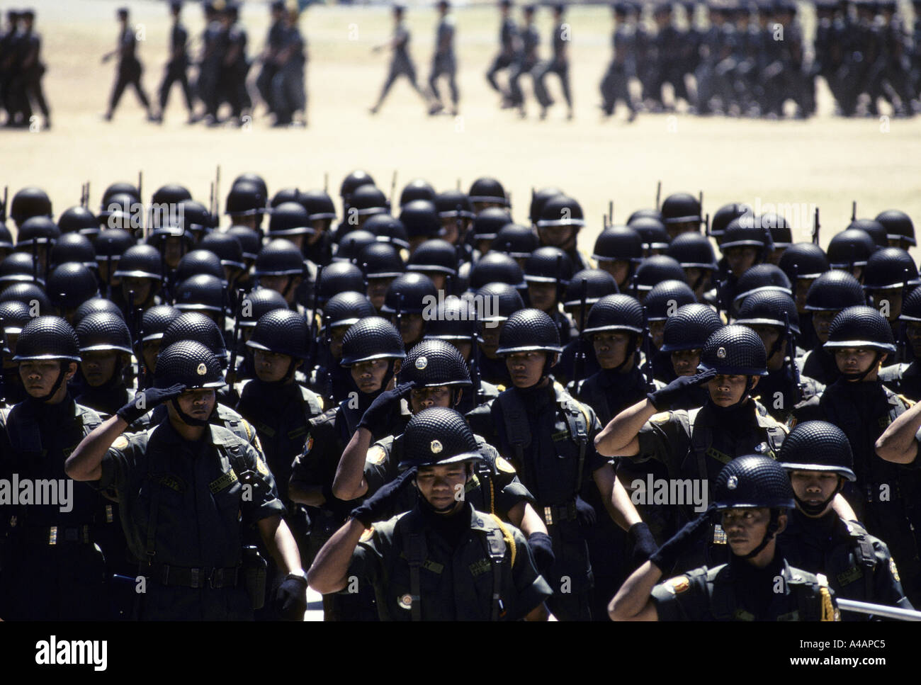 Philippines troops giving salute to President Aquino during a march ...