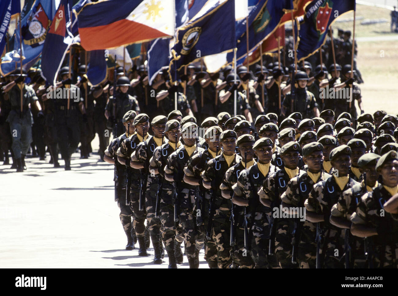 Philippines paratroopers during a march past at the Army Day ...