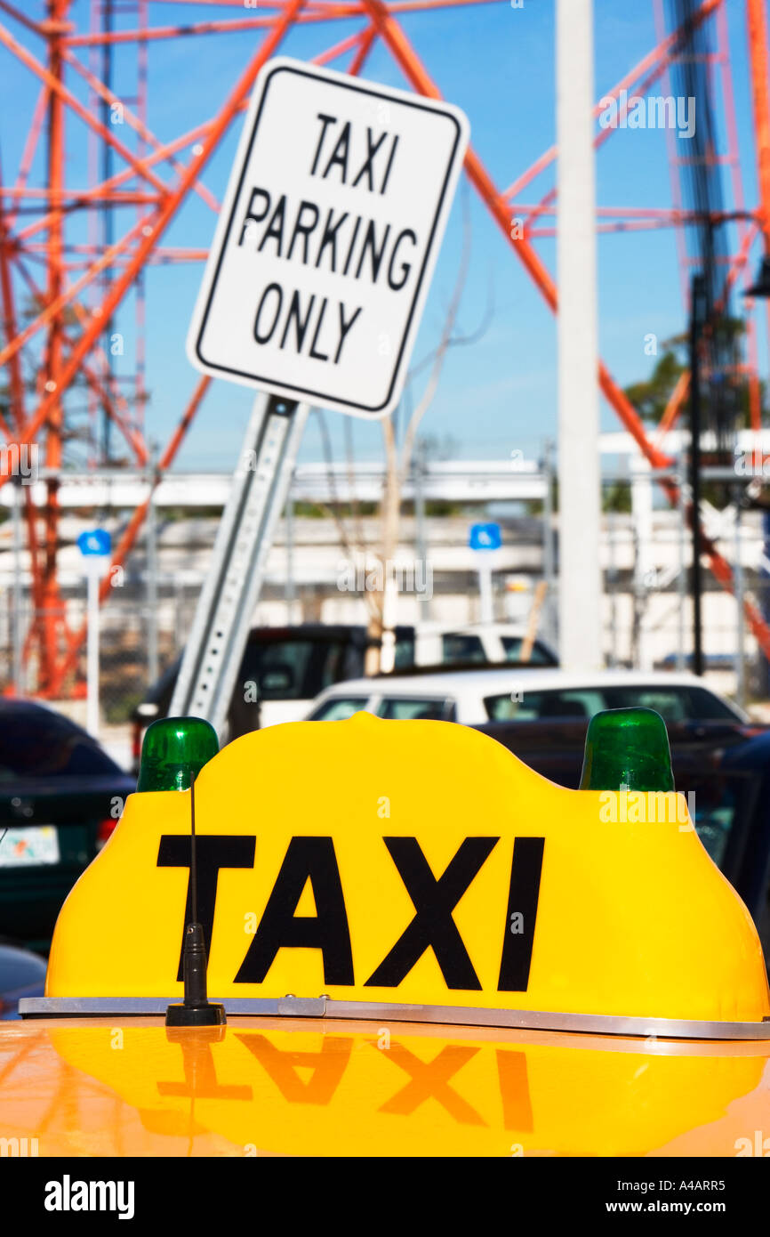 Taxi stand parking only sign signs information hi-res stock photography ...