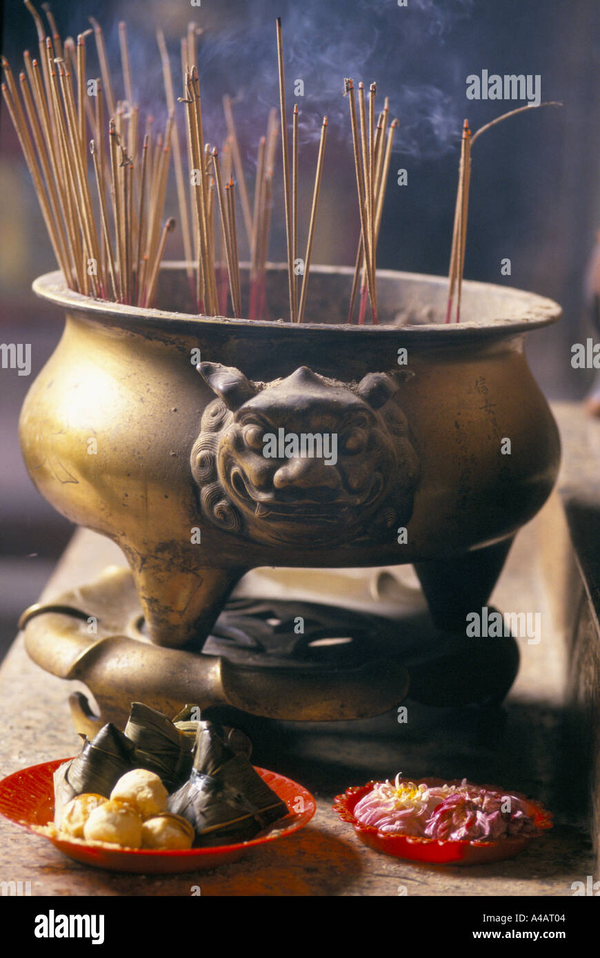 buddhist temple penang incense offerings Stock Photo - Alamy