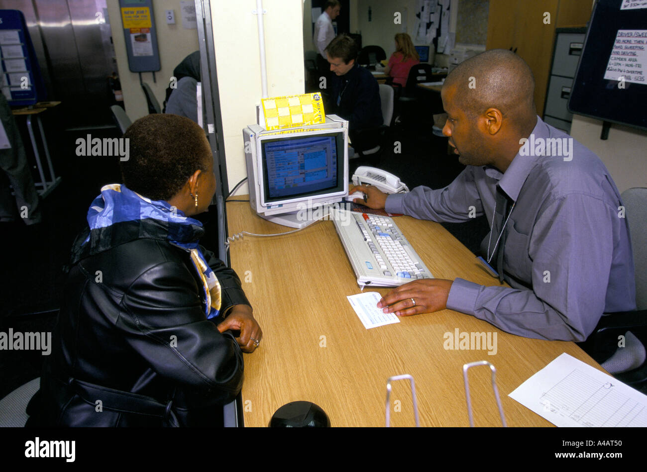 Staff at Camden Job Centre try to help a young woman find a job at her ...