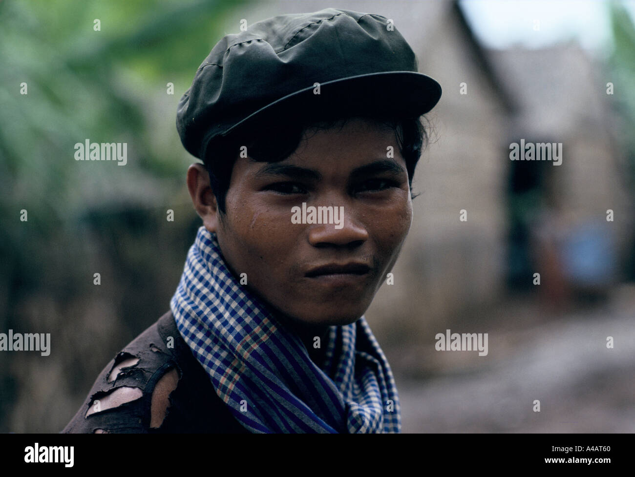 Portrait of a Khmer Rouge guerilla in uniform at a Khmer Rouge camp ...