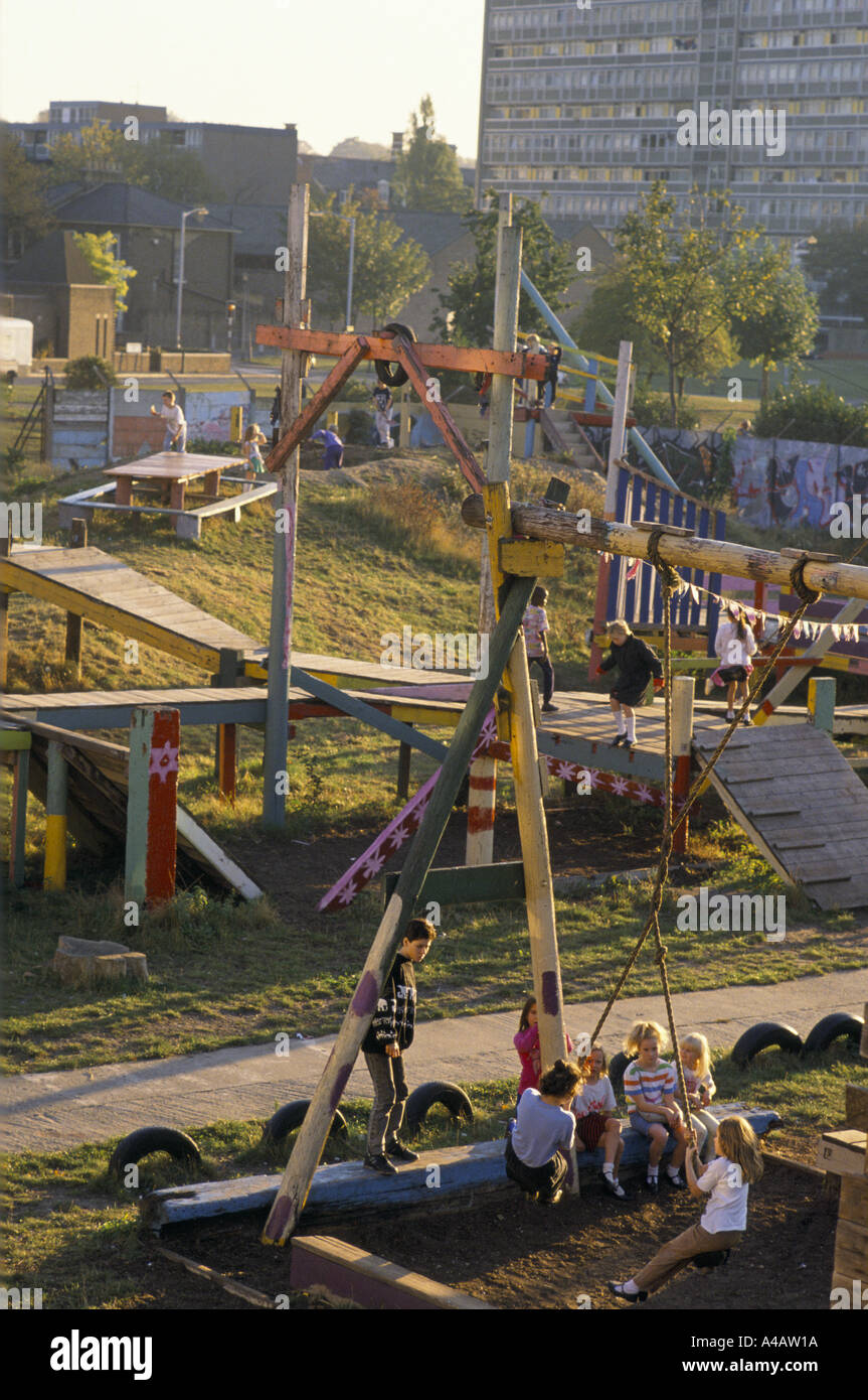 kids playing london housing estate adventure playground Stock Photo - Alamy