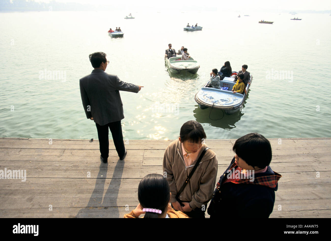 Beijing, China 1997: Chinese tourists boating on the Kunming Lake at ...