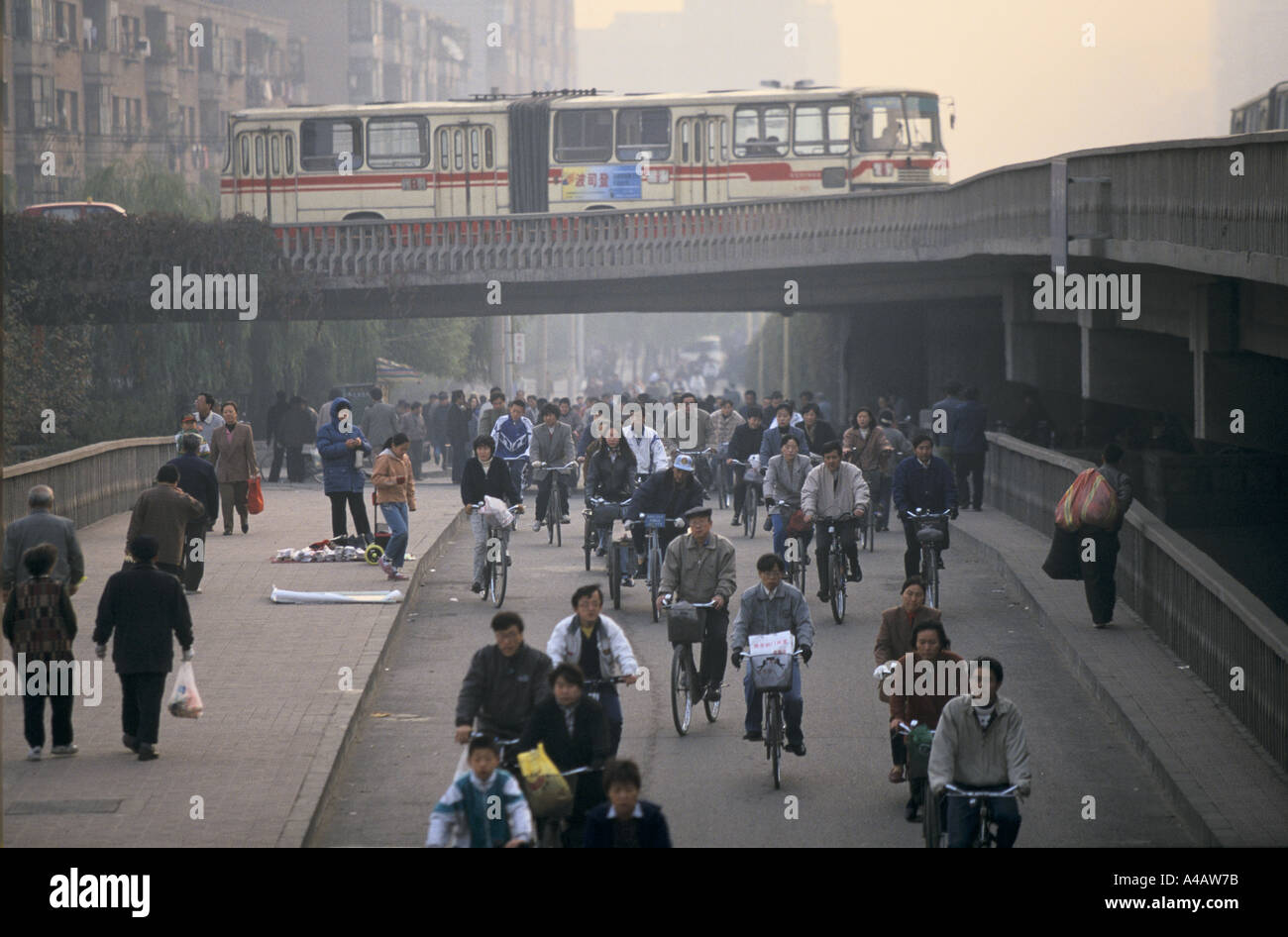 Beijing, China 1997: people cycle to work in winter Stock Photo - Alamy