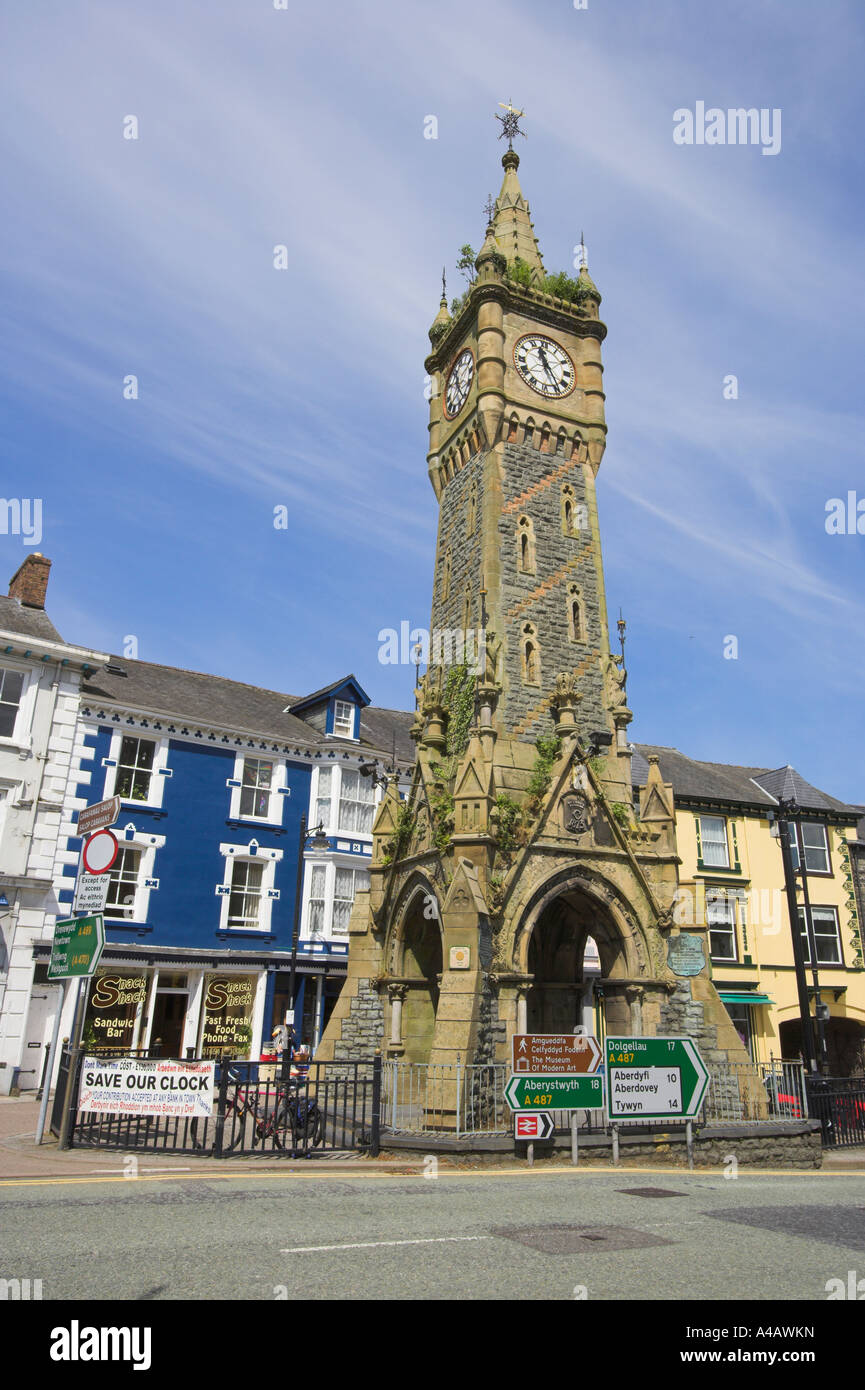 Machynlleth clock tower with buildings behind Stock Photo - Alamy