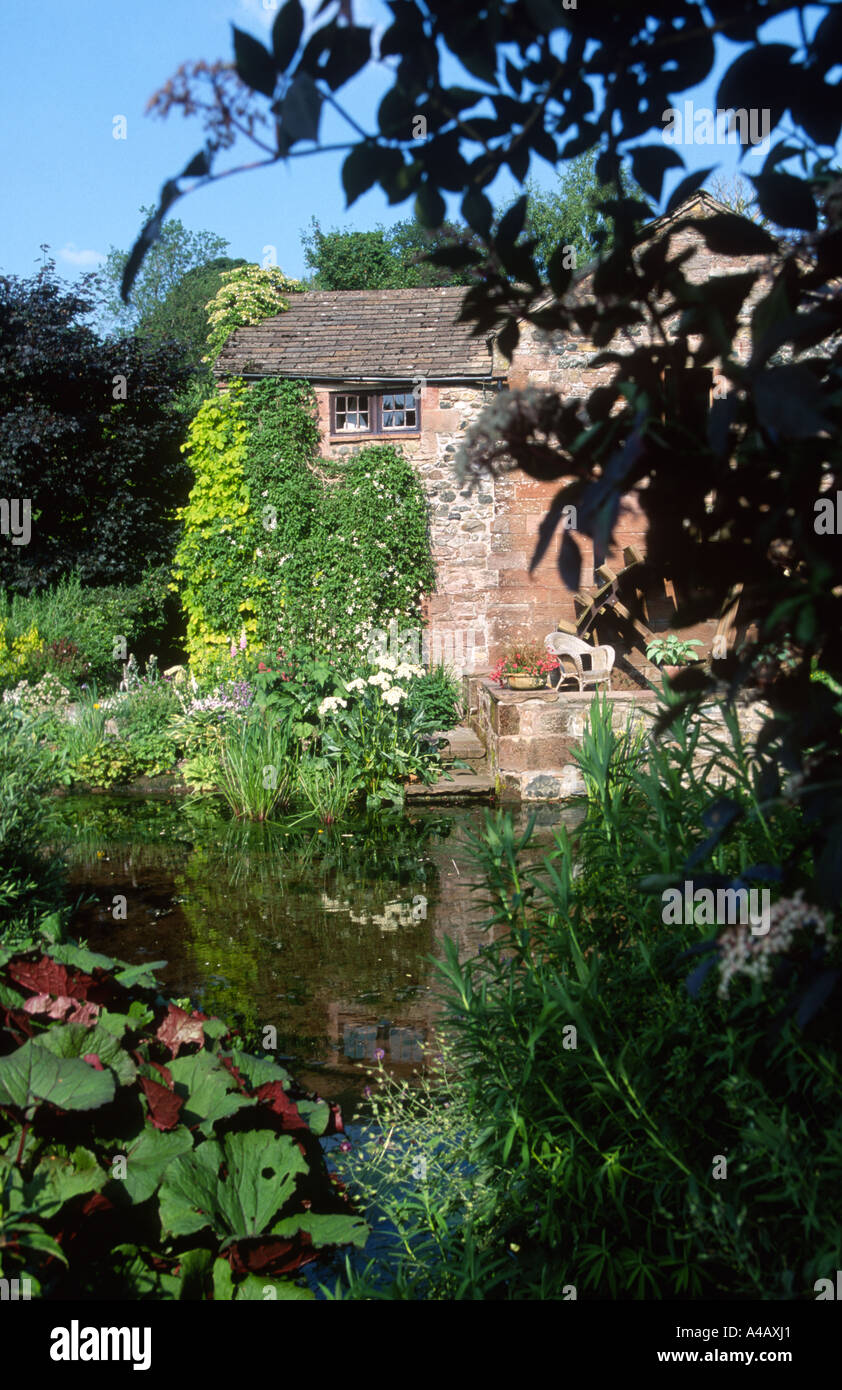 water mill converted into a house with the mill pond as a water feature ...