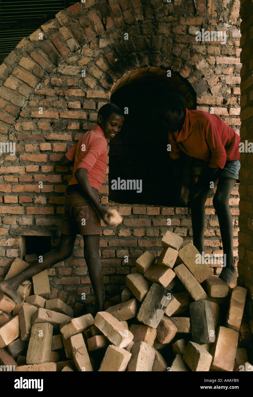 workers at brick co op using fuel efficient kiln to fire bricks Stock ...