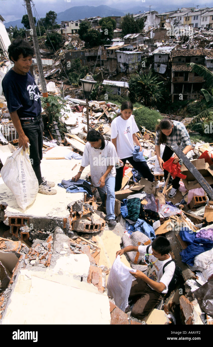 Earthquake in Colombia 1999 - picking through rubble of their homes for ...