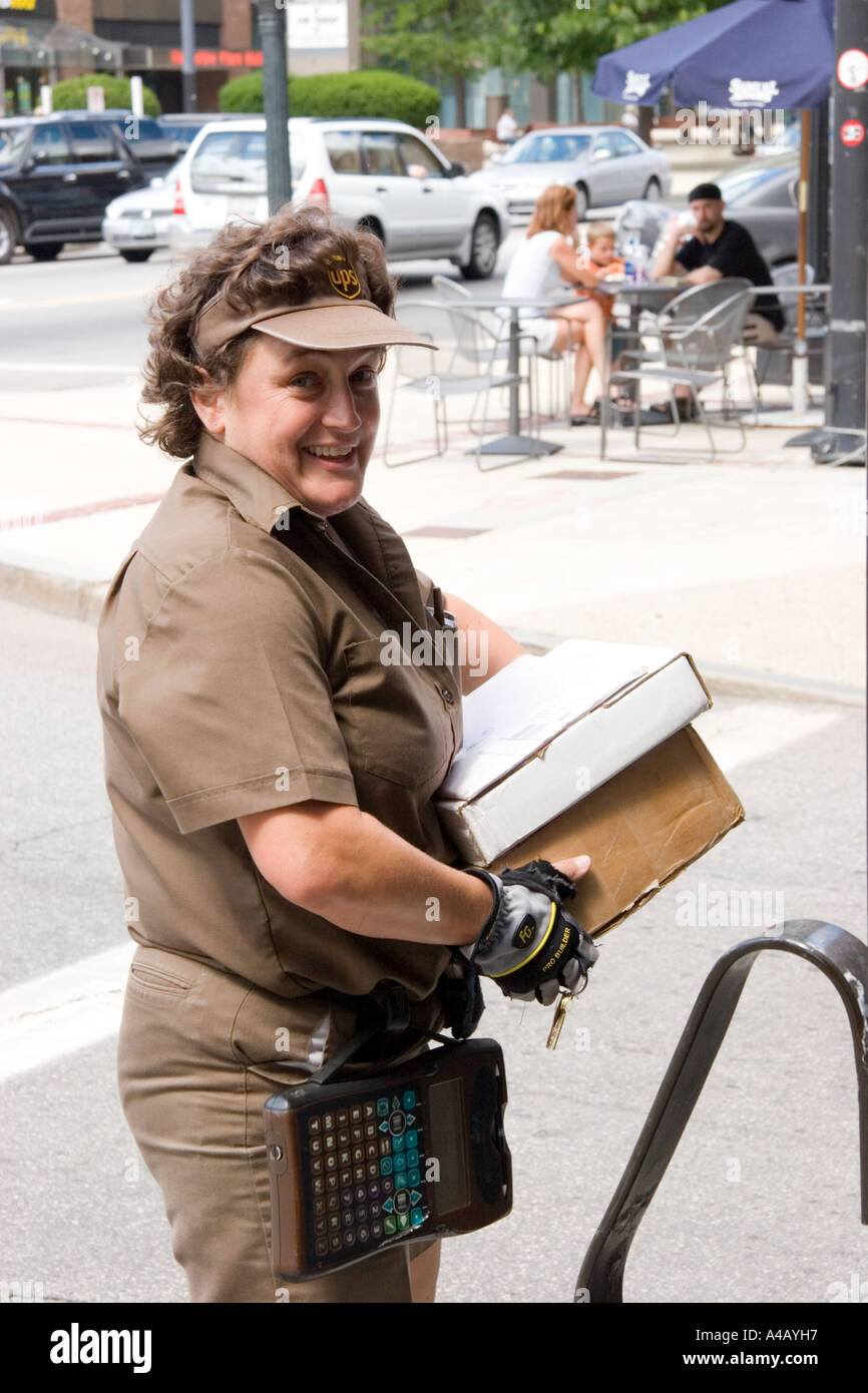 UPS Woman delivers packages Stock Photo - Alamy