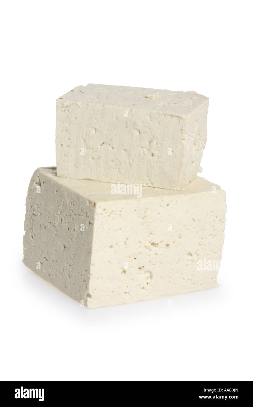 Tofu cut out on white background Stock Photo - Alamy