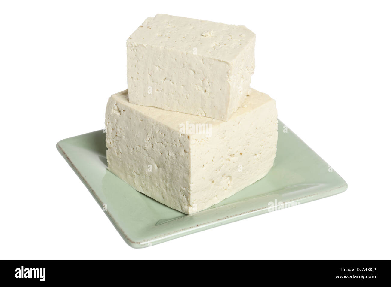 Tofu on Tray cut out on white background Stock Photo - Alamy