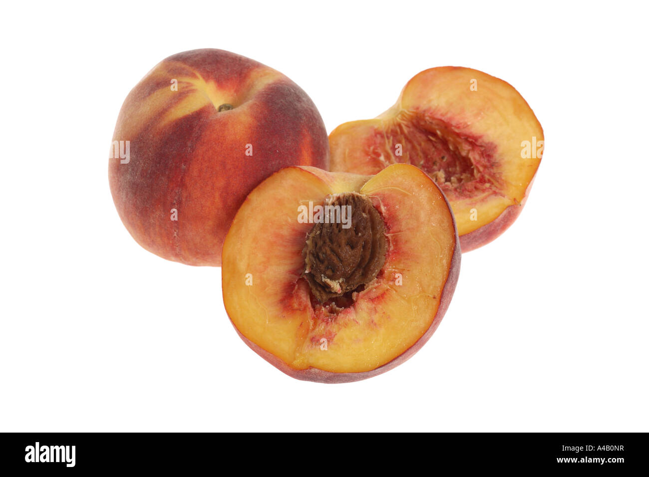 Peaches cut out on white background Stock Photo - Alamy