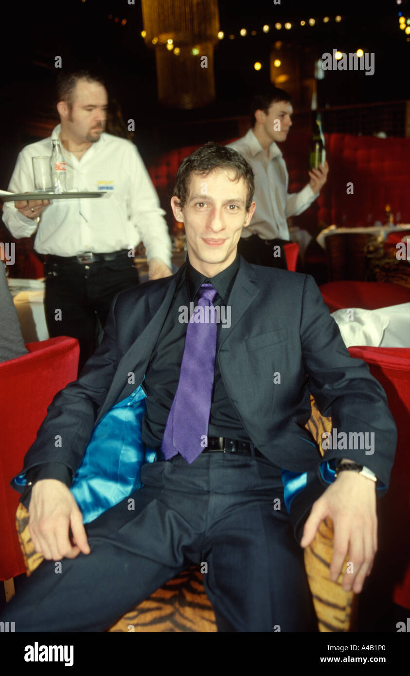 Actor Martin Hancock smoking a large cigar in The Reform restaurant in ...