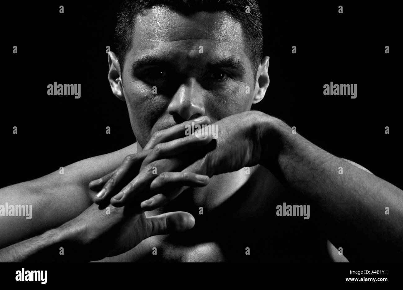 monochrome man folded arms portrait thinking striking Stock Photo - Alamy
