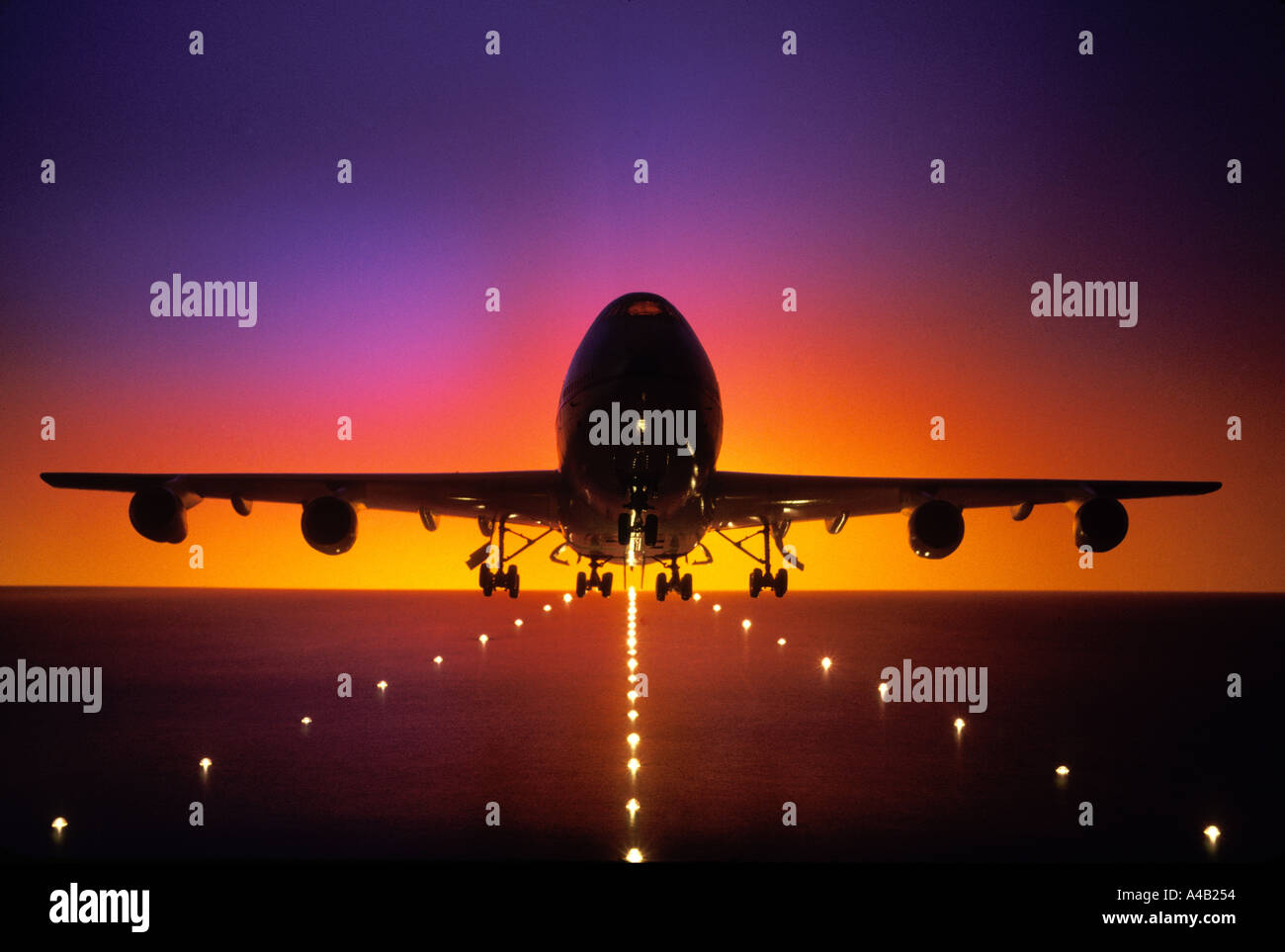model Boeing 747 in shortly after takeoff on lighted runway Stock Photo ...
