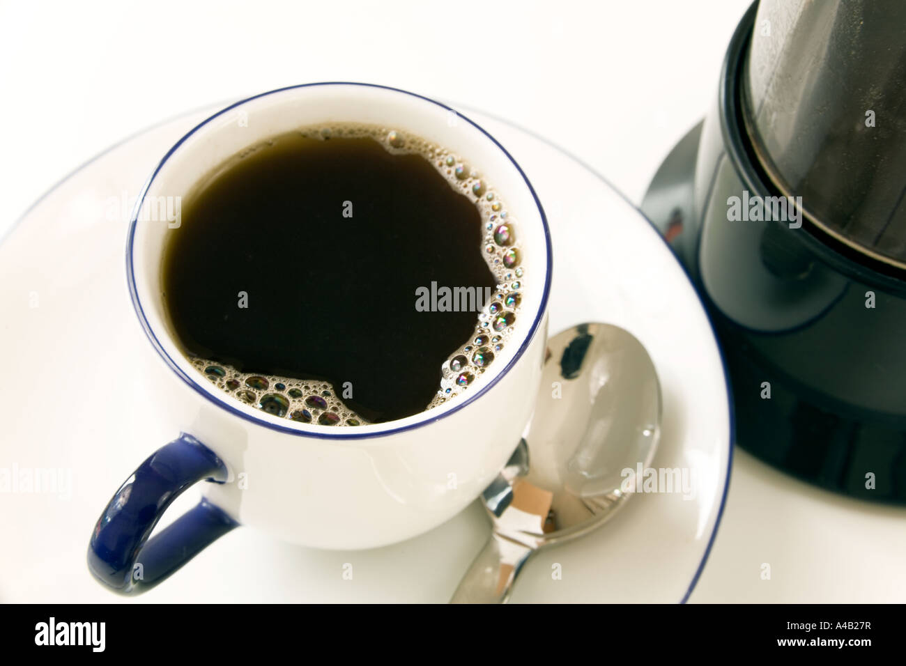 close up of full coffee cup with cafetiere Stock Photo - Alamy