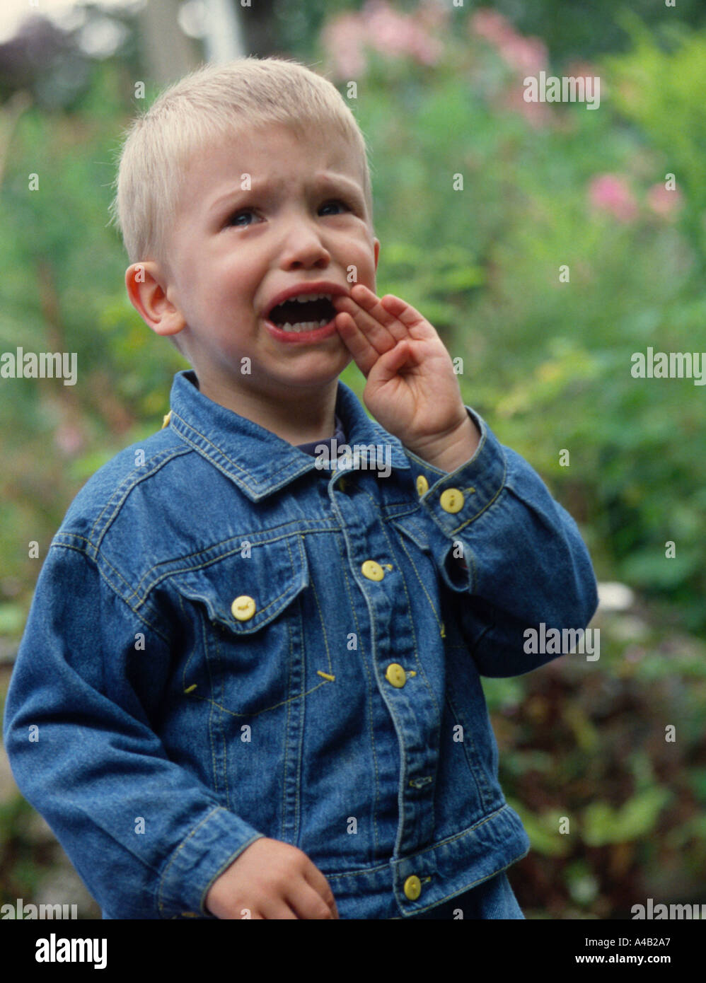 Weeping boy hi-res stock photography and images - Alamy