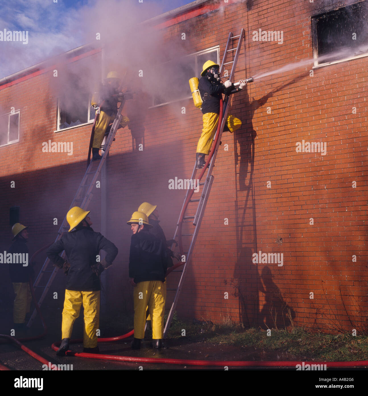Tending the fire hi-res stock photography and images - Alamy
