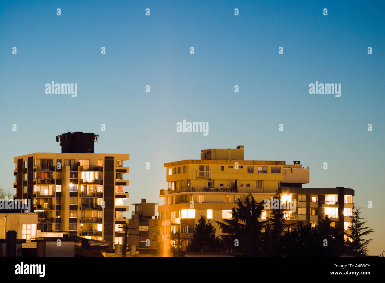 sunset on buildings Stock Photo - Alamy