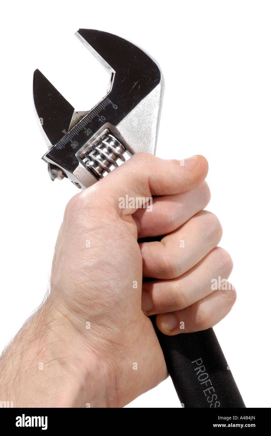 Hand with adjustable spanner Stock Photo - Alamy